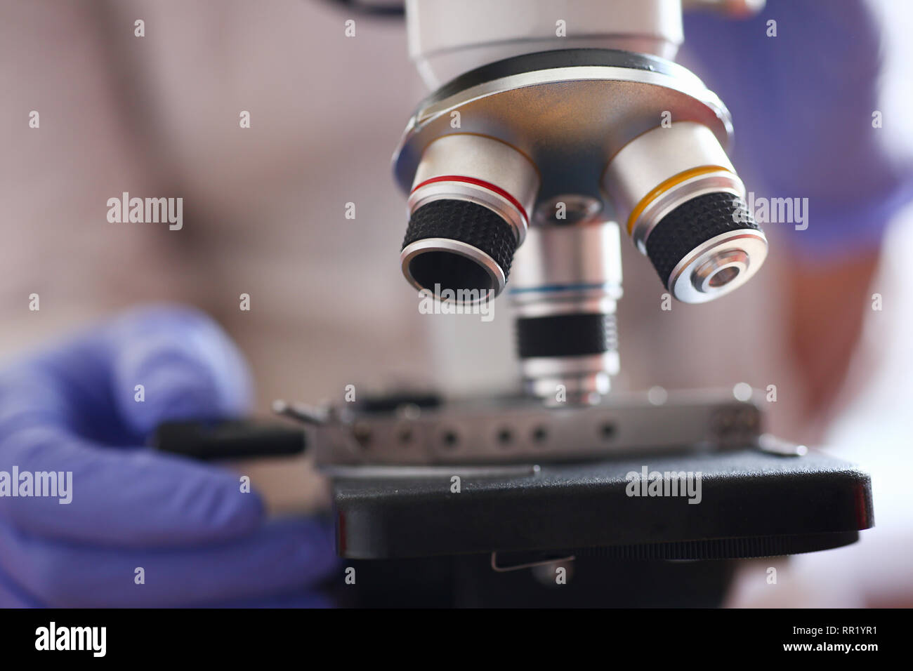 The head microscope on the background of Stock Photo - Alamy