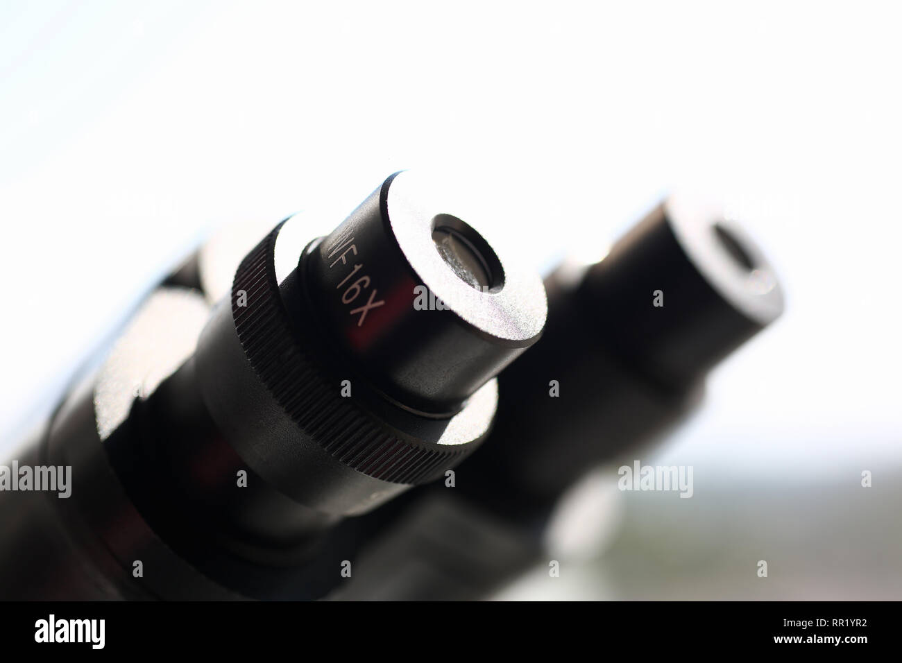 The head microscope on the background of Stock Photo - Alamy