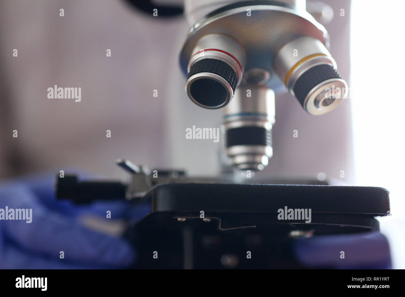 The head microscope on the background of Stock Photo - Alamy