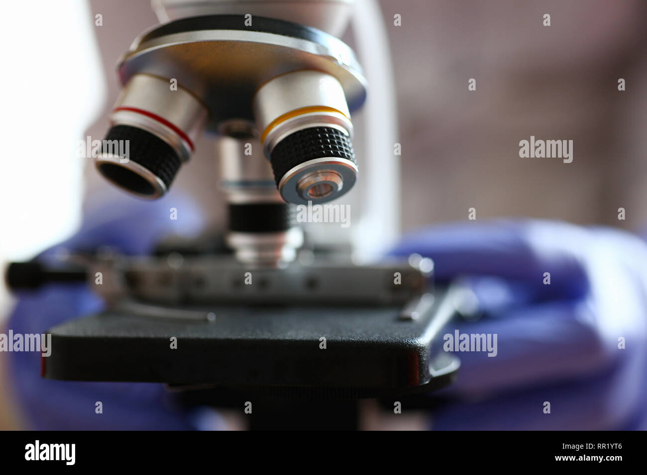 The head microscope on the background of Stock Photo - Alamy