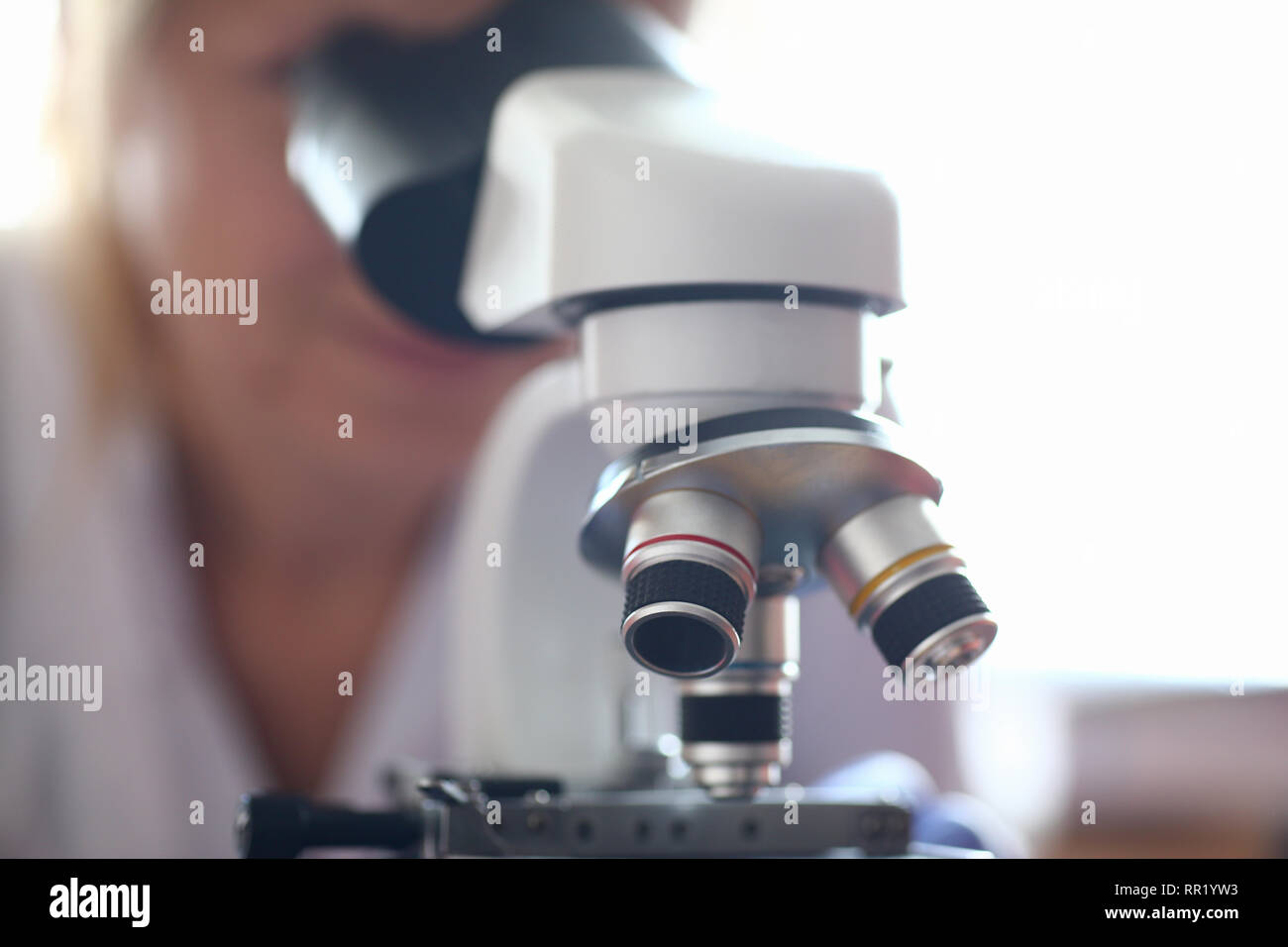 The head microscope on the background of Stock Photo - Alamy