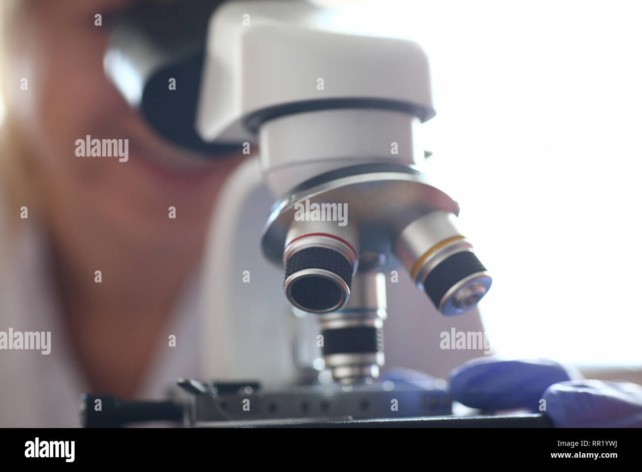 The head microscope on the background of Stock Photo - Alamy
