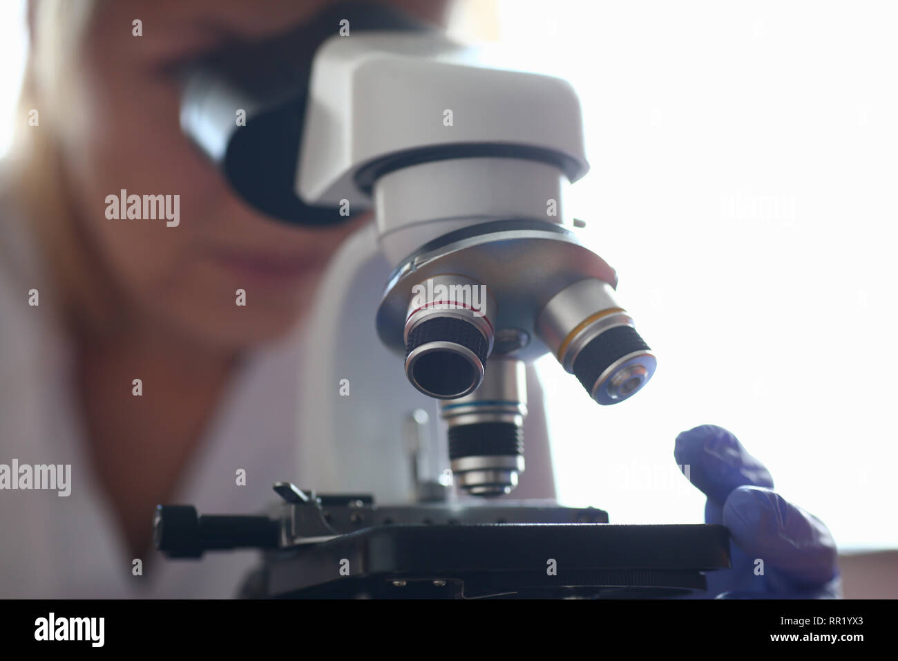 The head microscope on the background of Stock Photo - Alamy