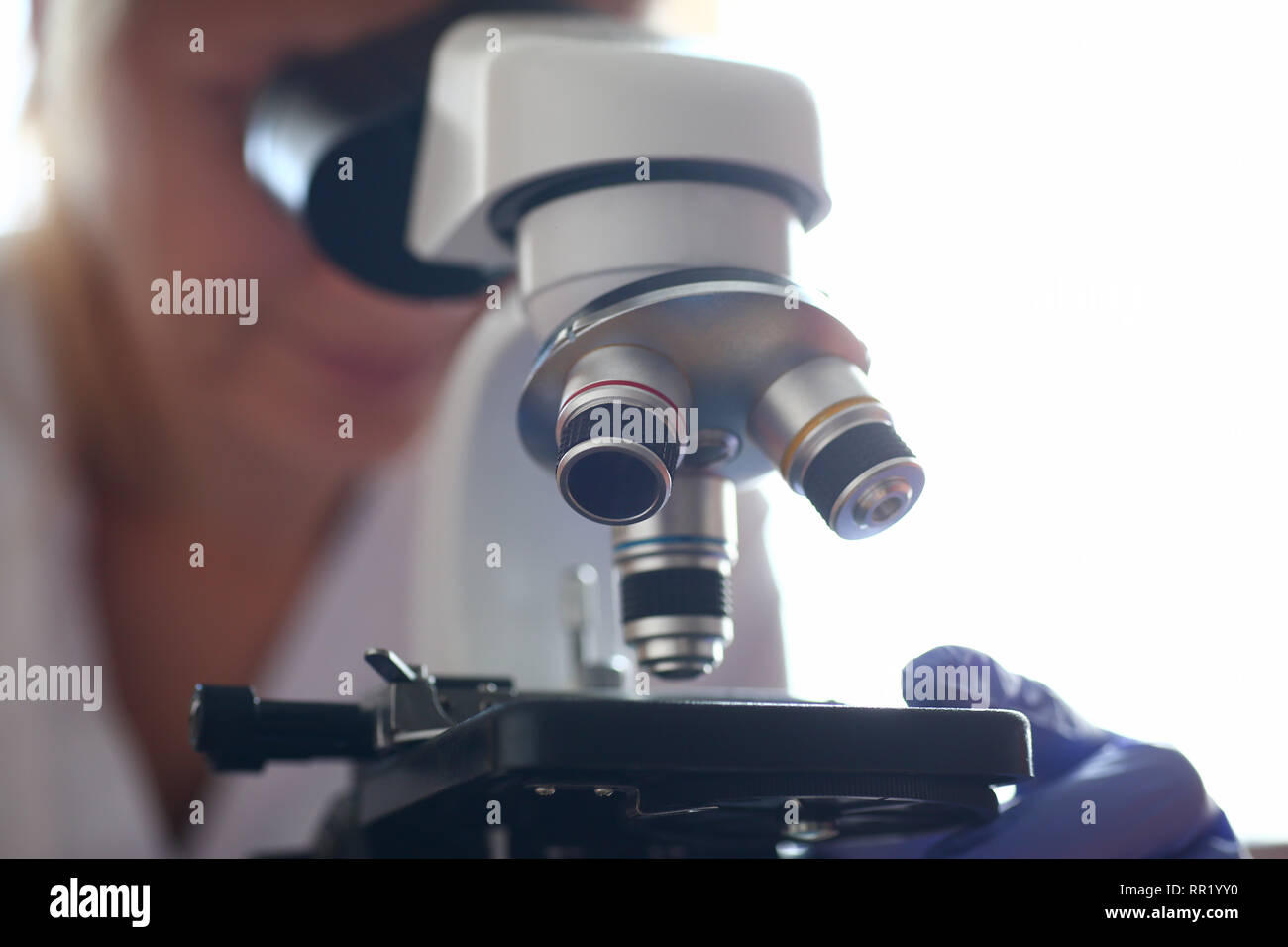 The head microscope on the background of Stock Photo - Alamy