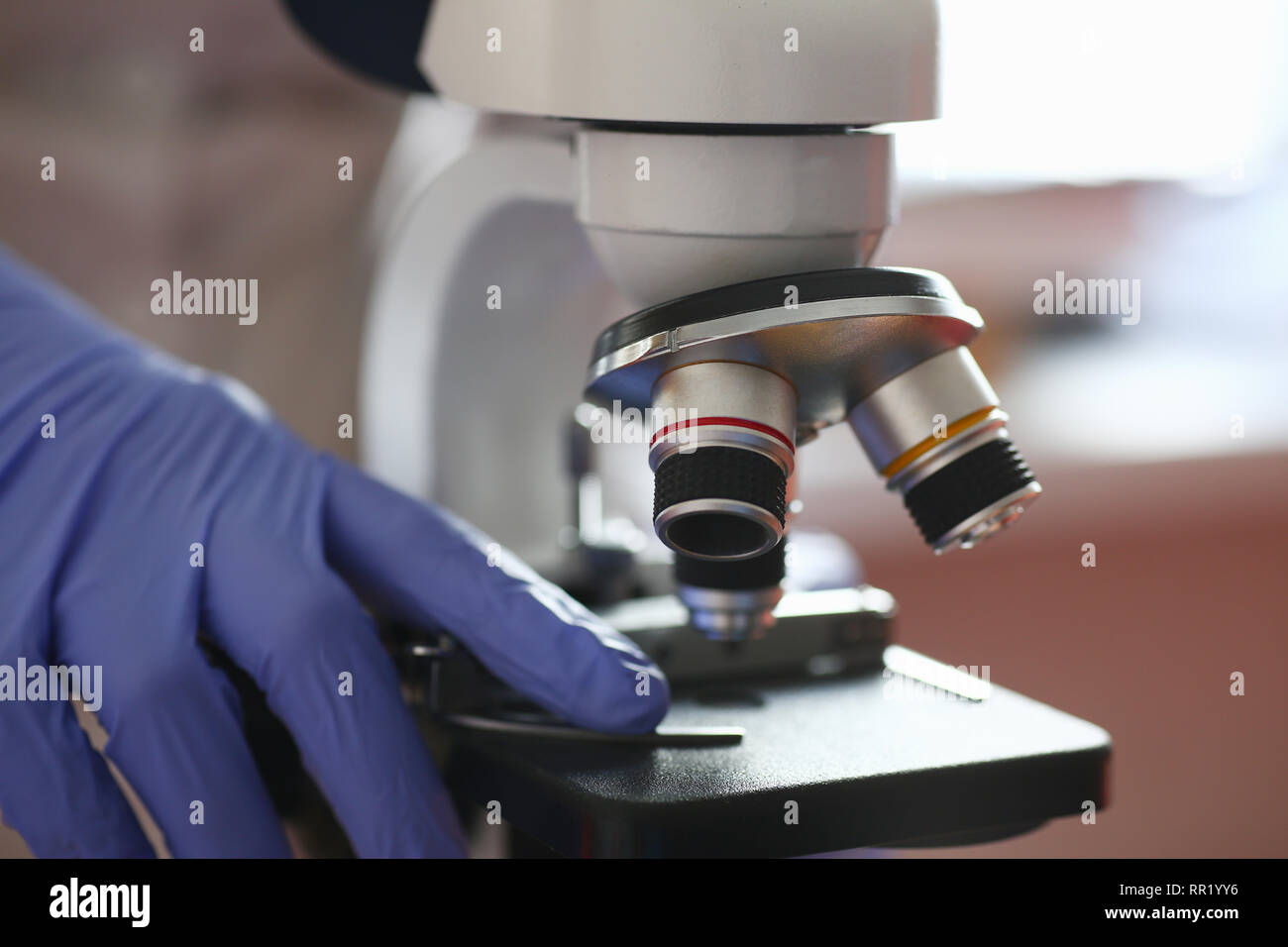 The head microscope on the background of Stock Photo - Alamy
