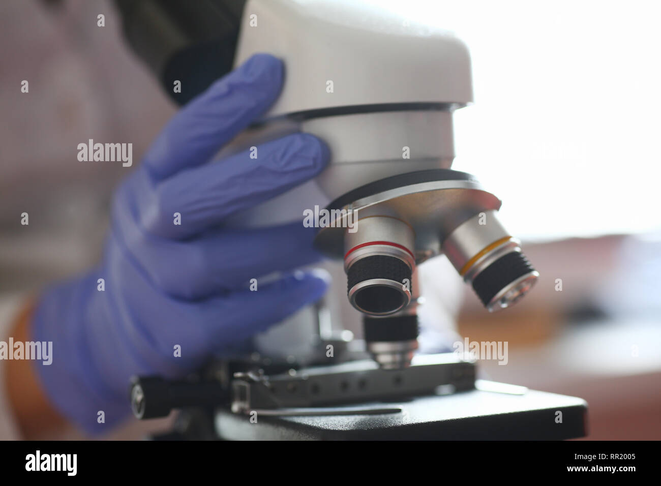 The head microscope on the background of Stock Photo - Alamy
