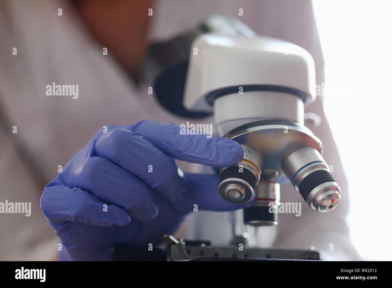The head microscope on the background of Stock Photo - Alamy