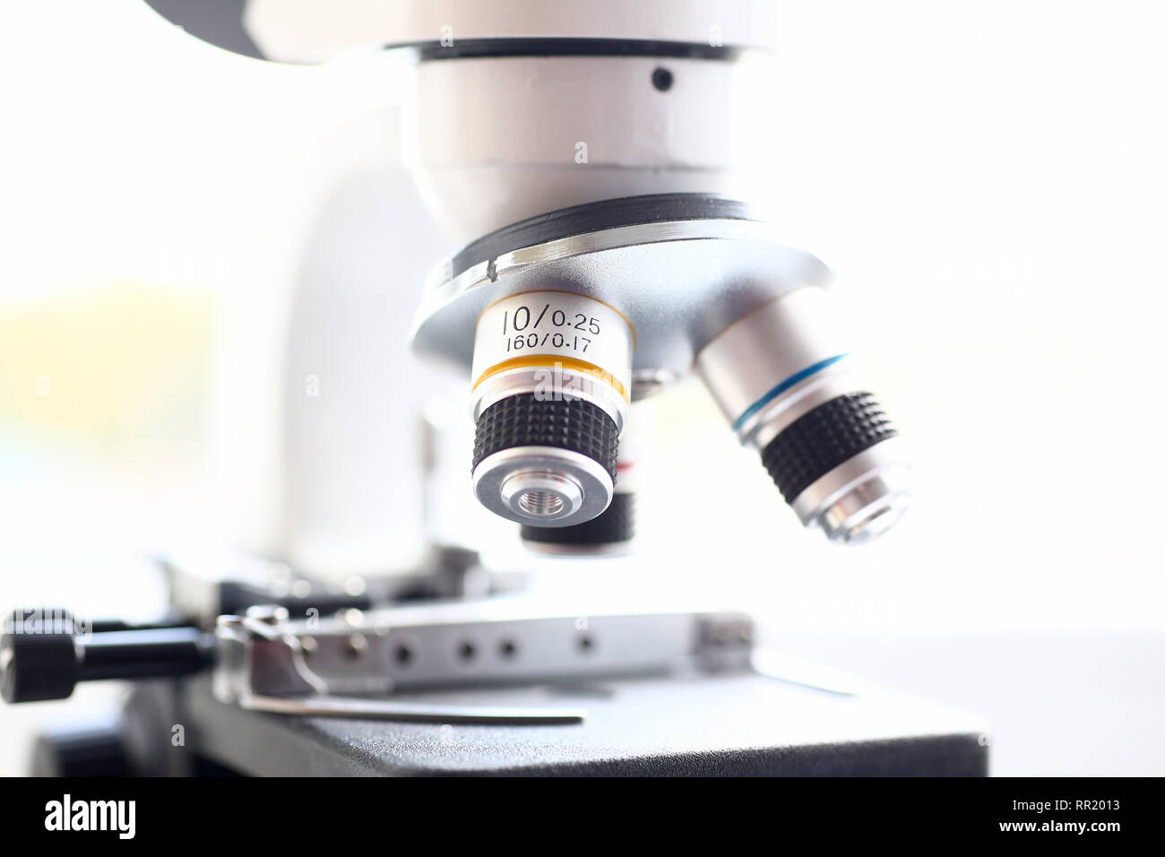 The head microscope on the background of Stock Photo - Alamy