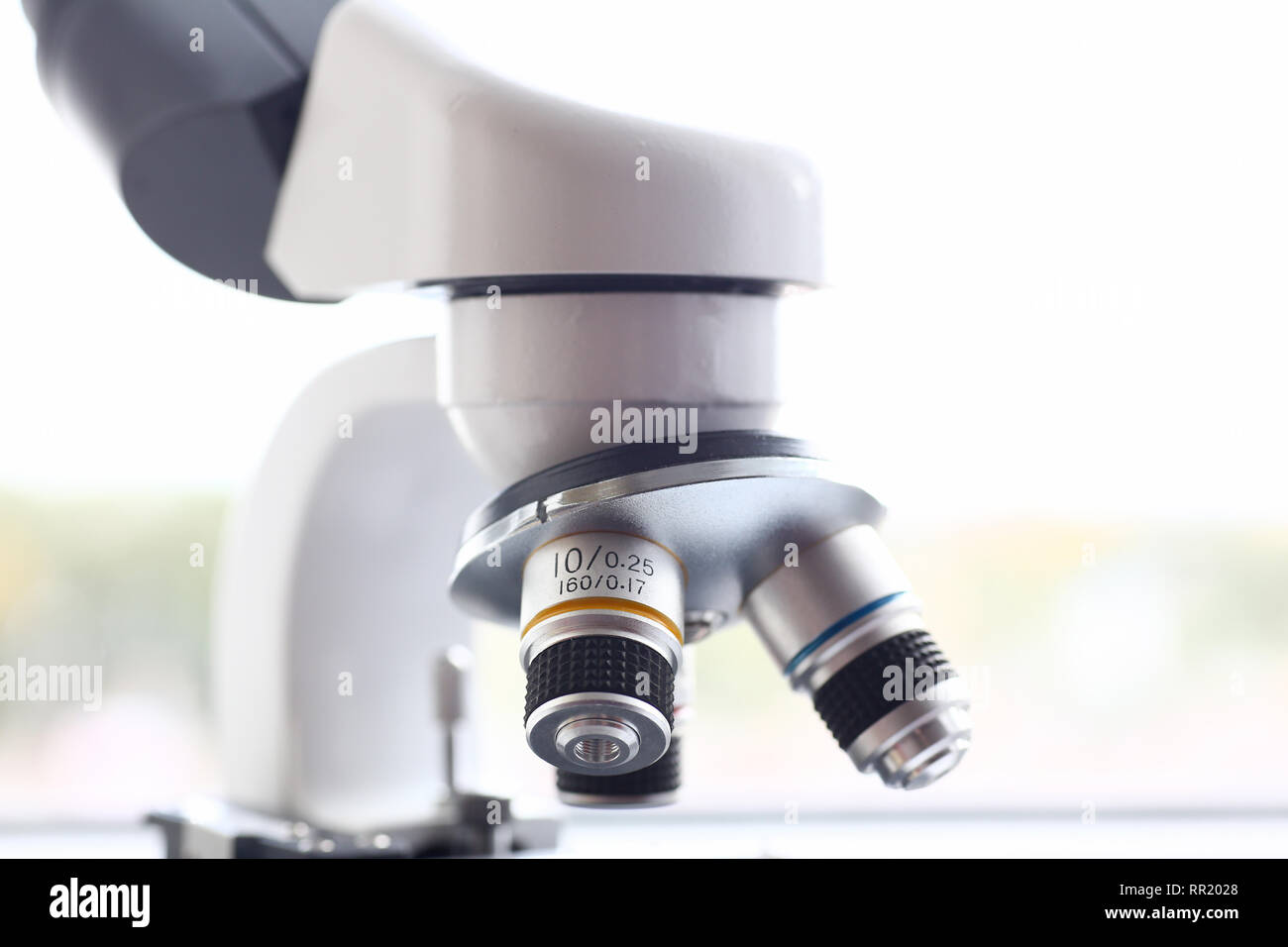 The head microscope on the background of Stock Photo - Alamy