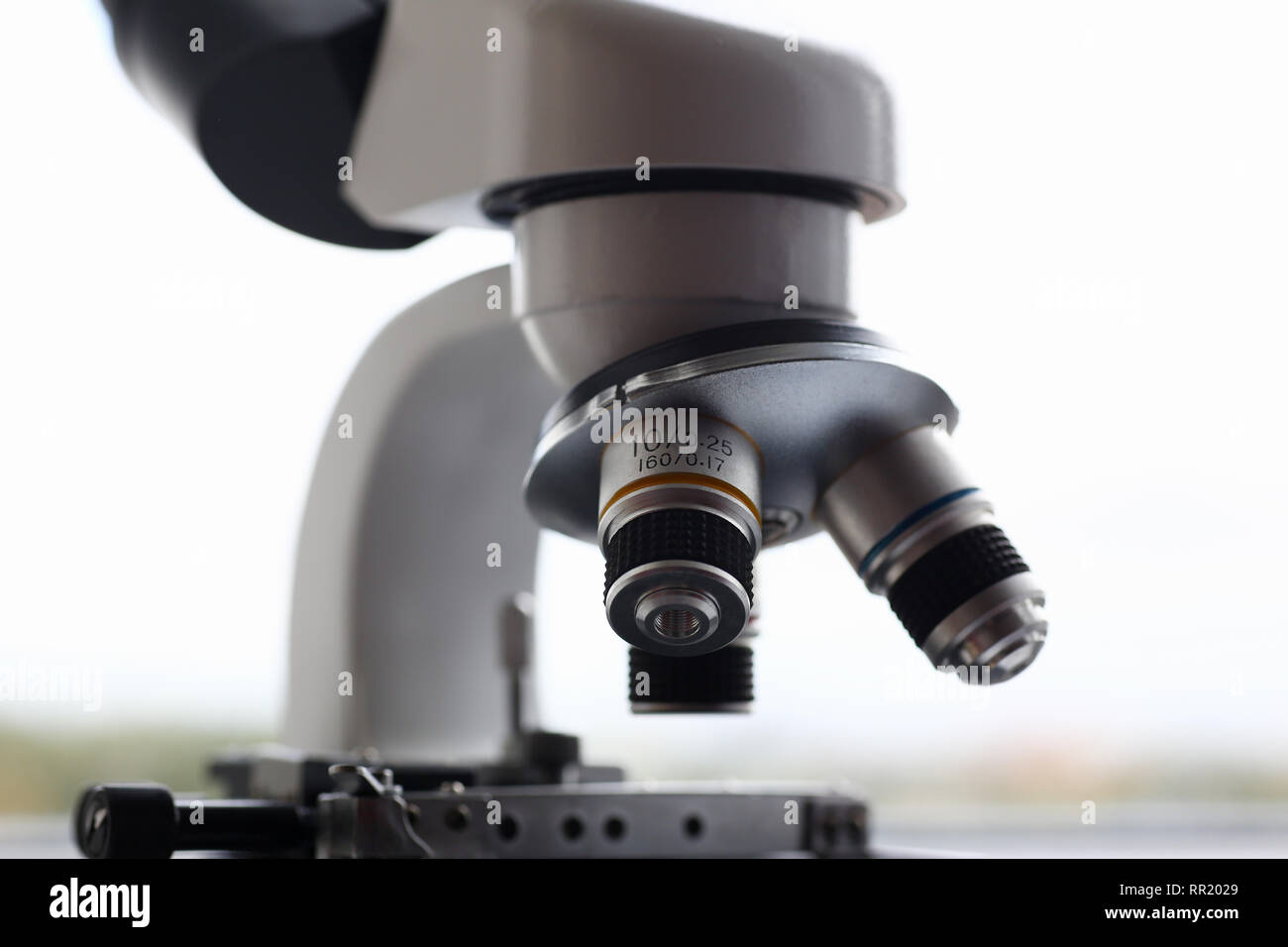 The head microscope on the background of Stock Photo - Alamy