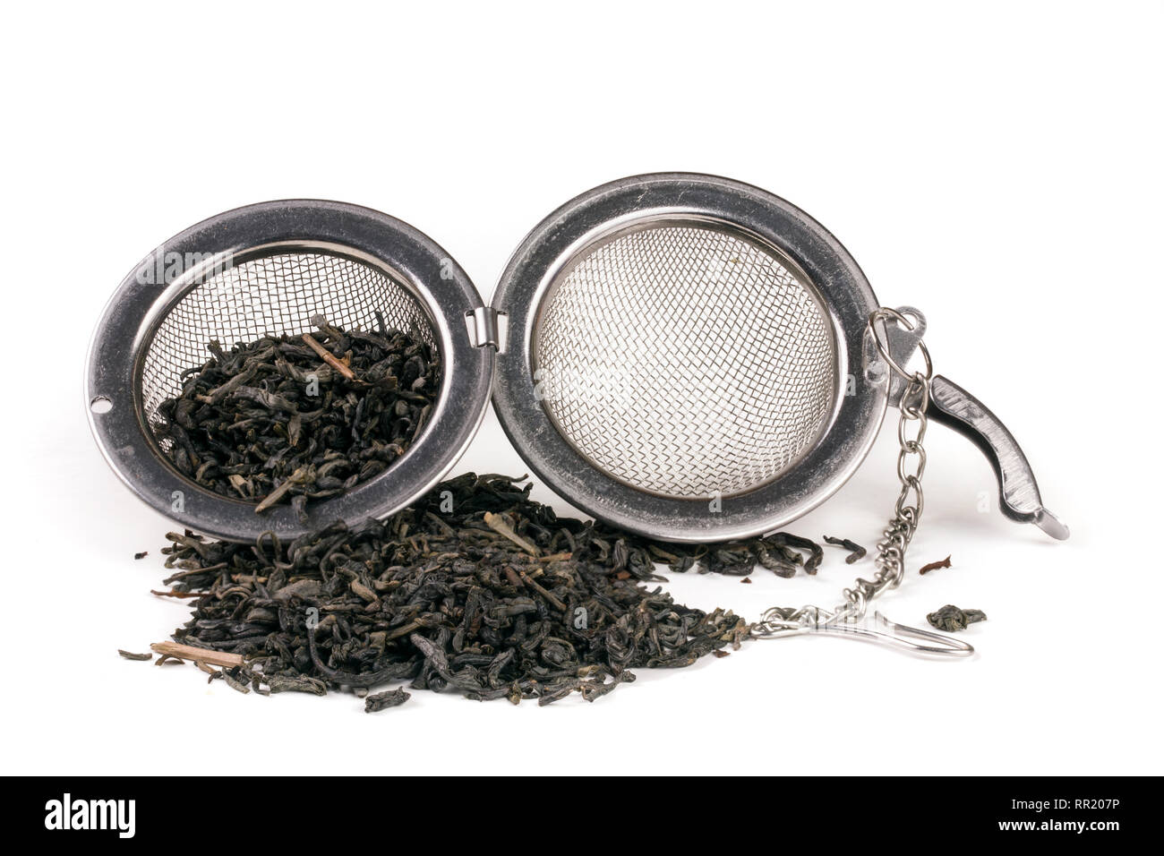 tea strainer on a chain isolated white background Stock Photo - Alamy