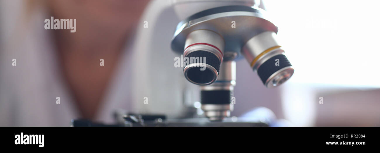 The head microscope on the background of Stock Photo - Alamy