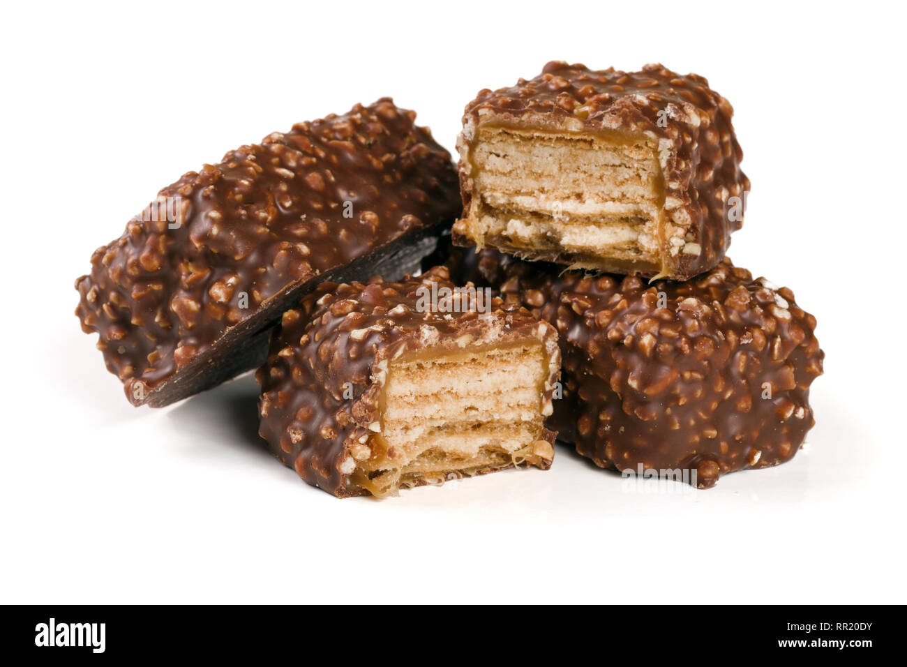 chocolate candy with nuts isolated on white background Stock Photo - Alamy