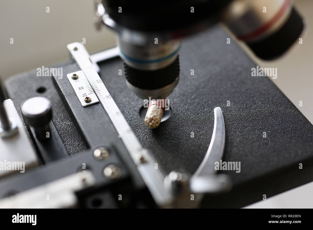 The head microscope on the background of Stock Photo - Alamy