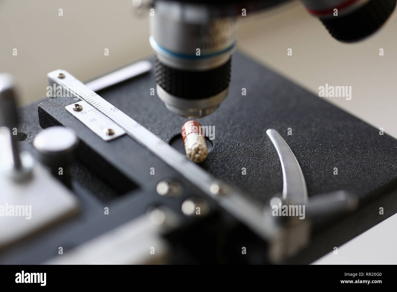 The head microscope on the background of Stock Photo - Alamy