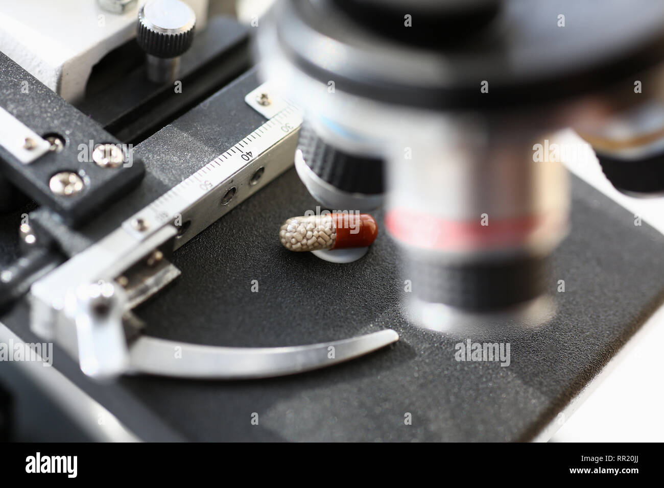 The head microscope on the background of Stock Photo - Alamy