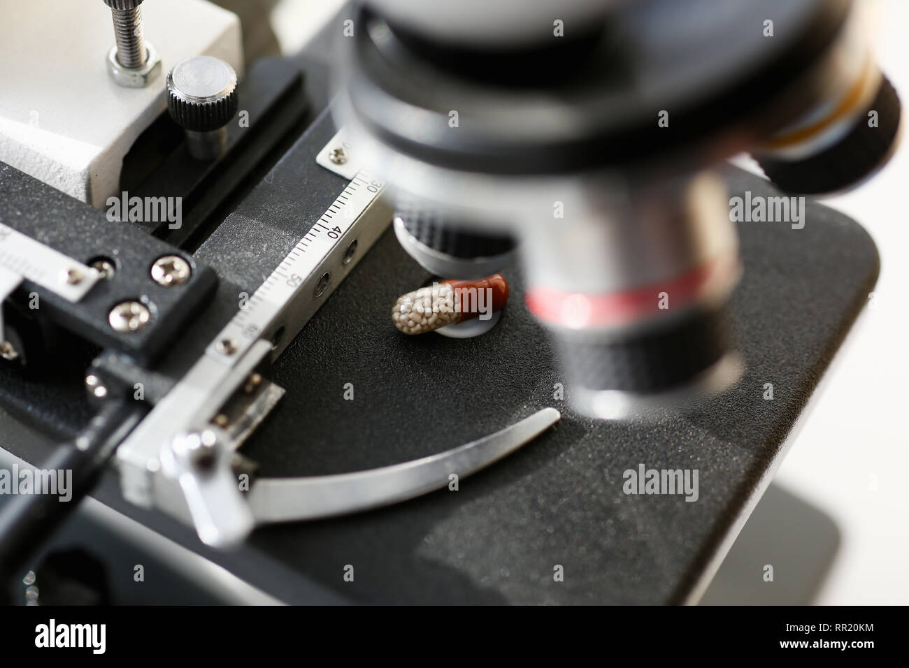 The head microscope on the background of Stock Photo - Alamy