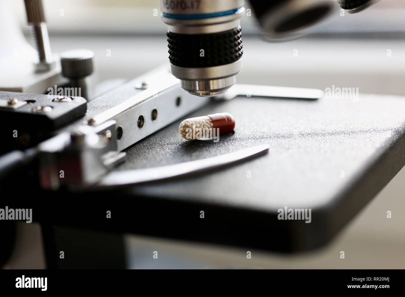 The head microscope on the background of Stock Photo - Alamy