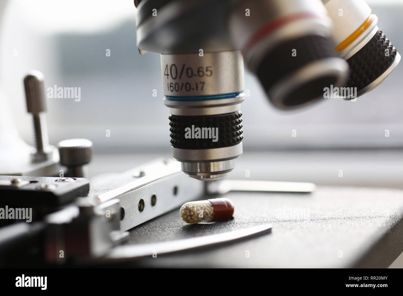The head microscope on the background of Stock Photo - Alamy