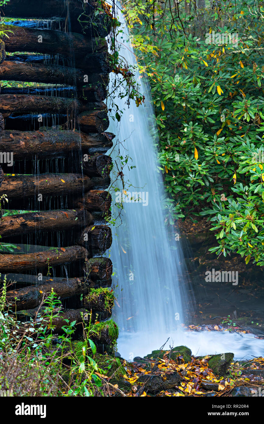 Log Structure & Waterfall Stock Photo - Alamy