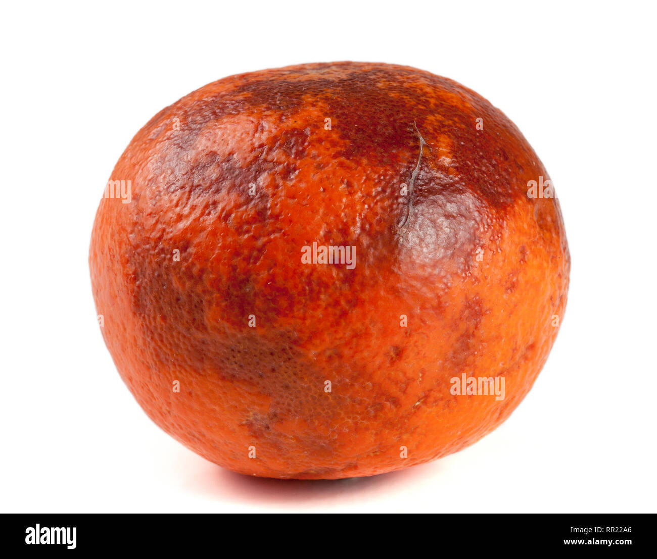 one damaged tangerine isolated on white background Stock Photo - Alamy