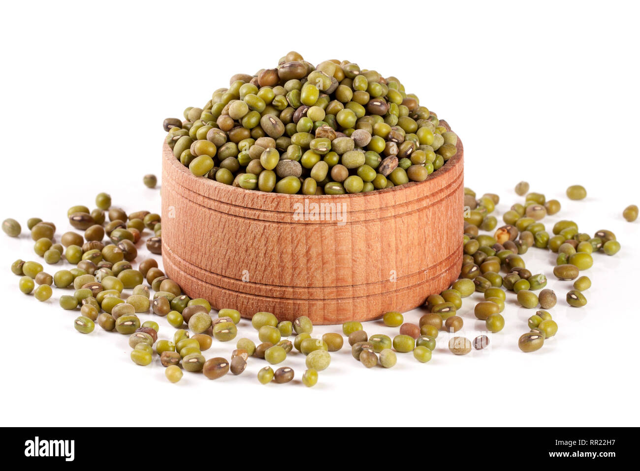 mung bean in a wooden bowl isolated on white background Stock Photo - Alamy