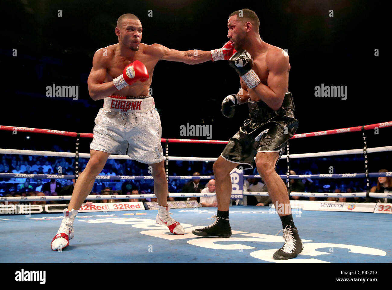 Chris Eubank Jr (left) lands a punch on James DeGale in the Vacant Ibo ...