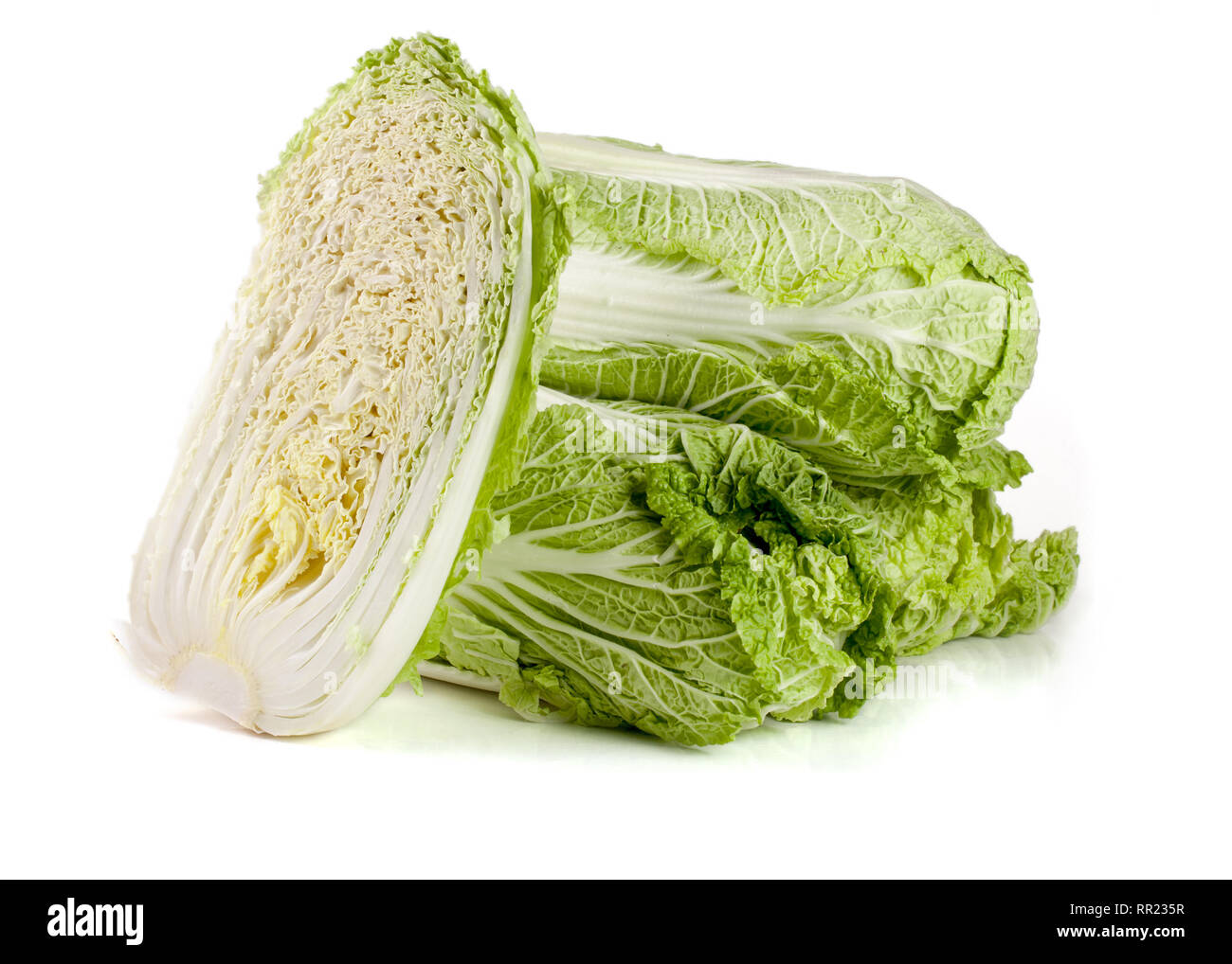 three chinese cabbage and half isolated on white background Stock Photo ...
