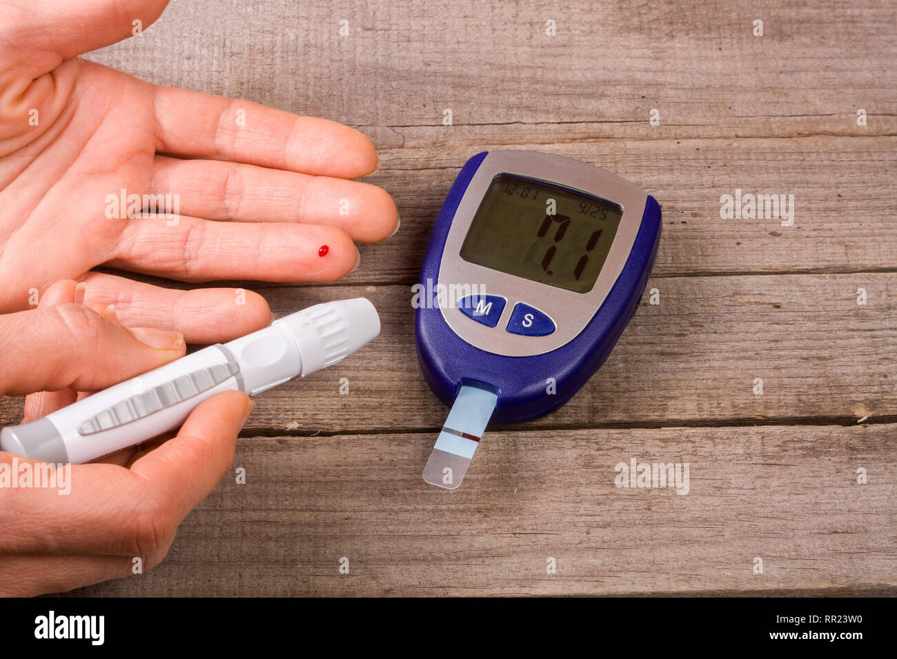Diabetes finger glucose meter hi-res stock photography and images - Alamy