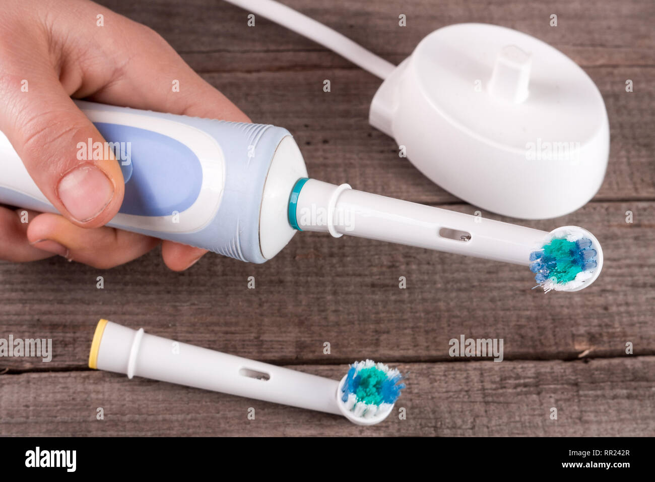 Hold toothbrush hi-res stock photography and images - Alamy