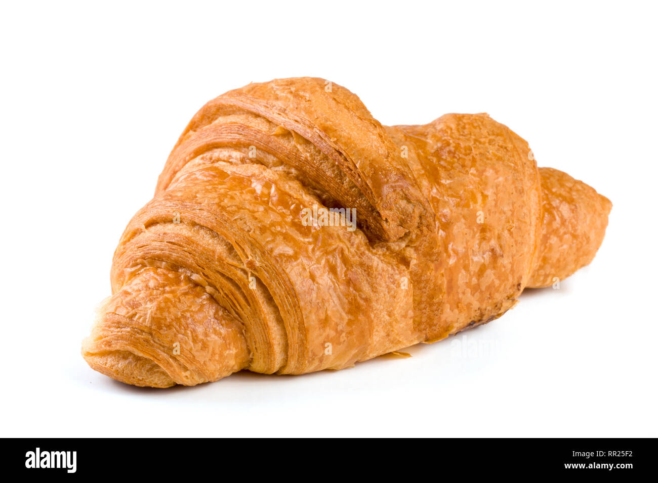 one croissant isolated over a white background closeup Stock Photo - Alamy