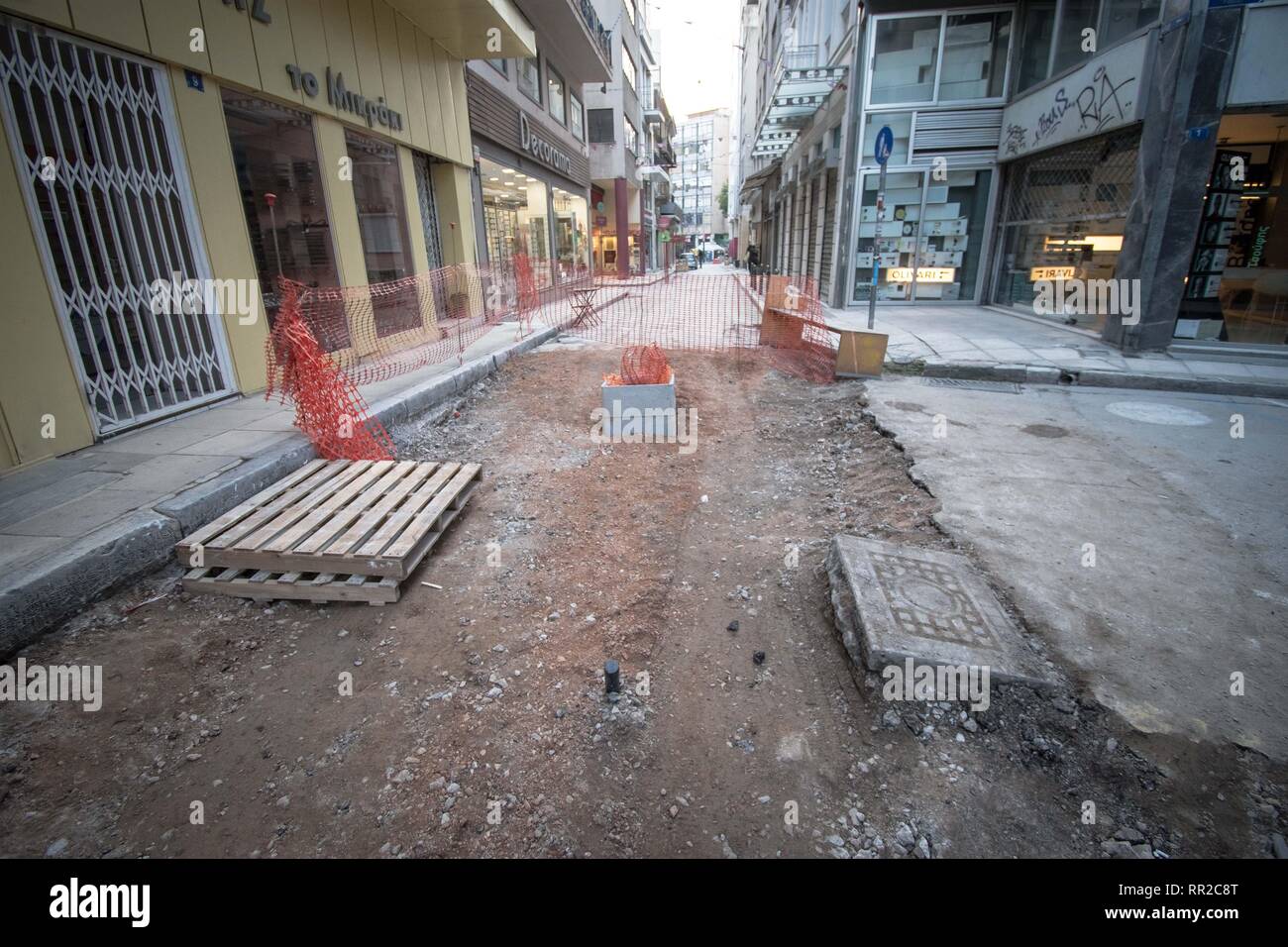A damaged road seen under construction. Many damaged roads are under ...
