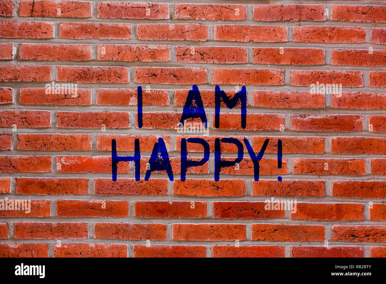 Smiley graffiti a wall hi-res stock photography and images - Alamy