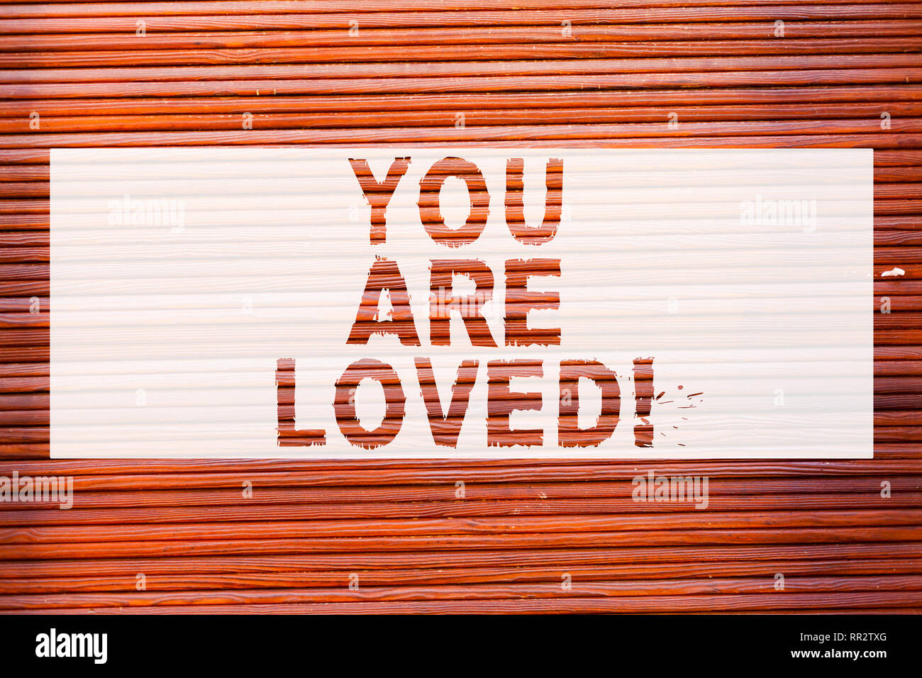 Writing note showing You Are Loved. Business photo showcasing Somebody ...