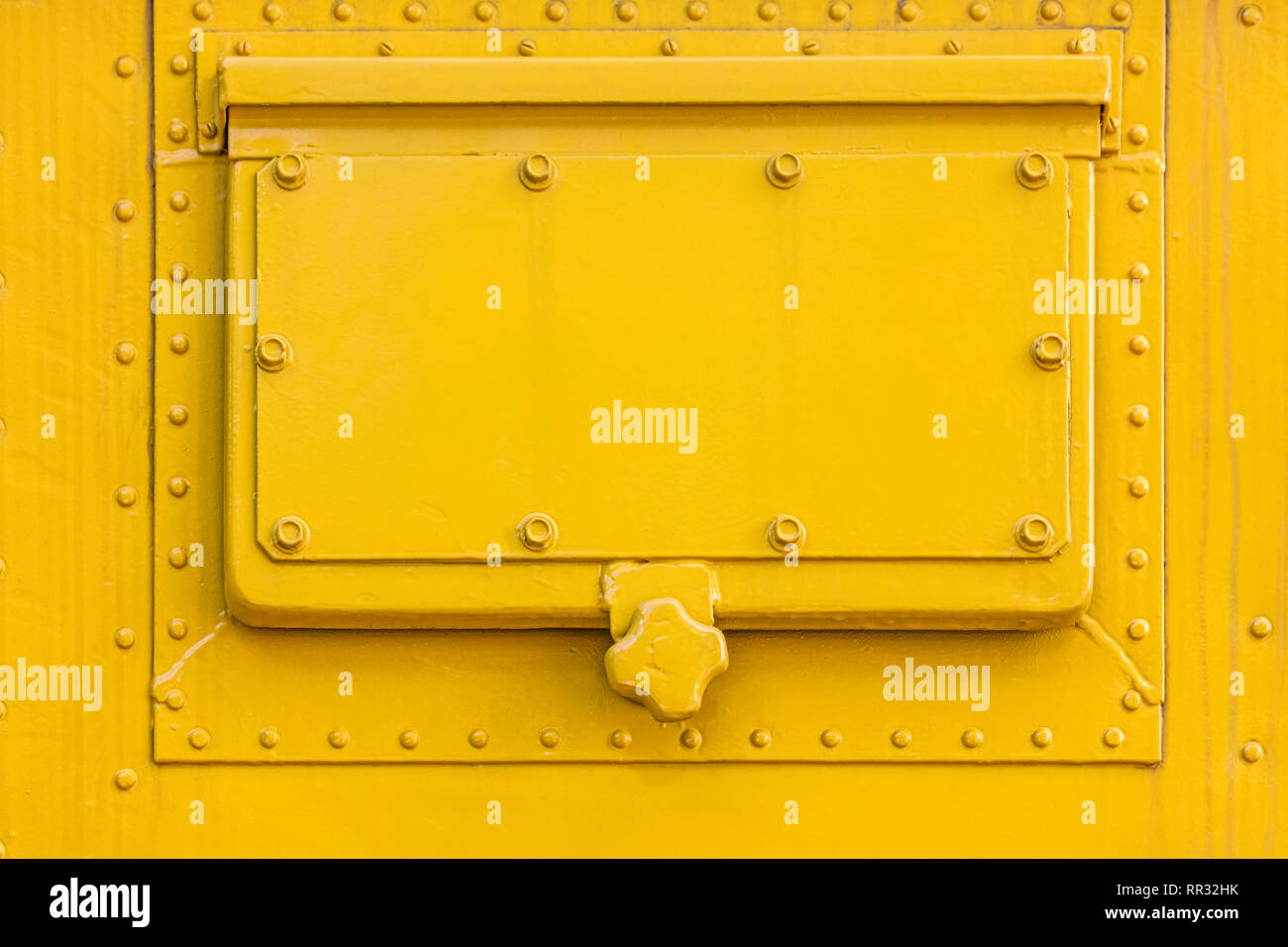 bright yellow painted metal plate texture with hatch and rivets Stock ...