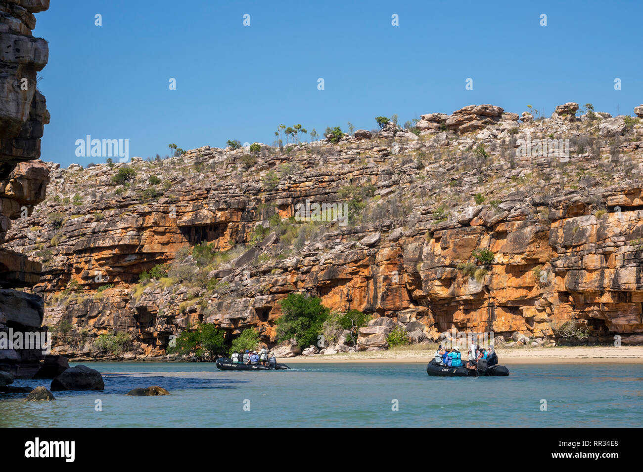 Zodiacs from L'Austral exploring Pangali Cove, Koolama Bay, Western ...