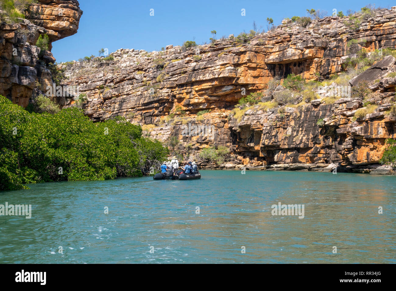 Zodiacs from L'Austral exploring Pangali Cove, Koolama Bay, Western ...