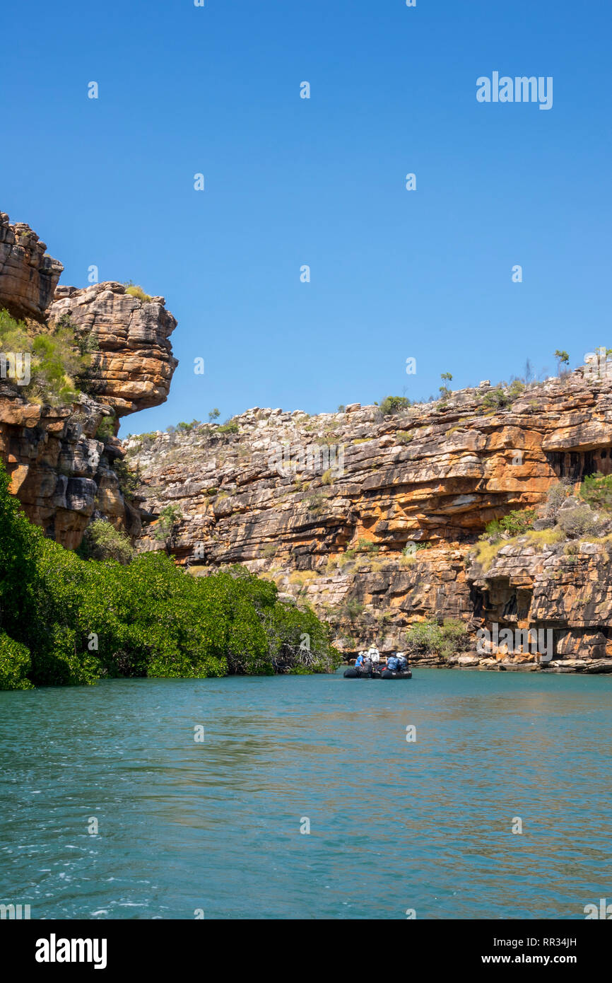 Zodiacs from L'Austral exploring Pangali Cove, Koolama Bay, Western ...