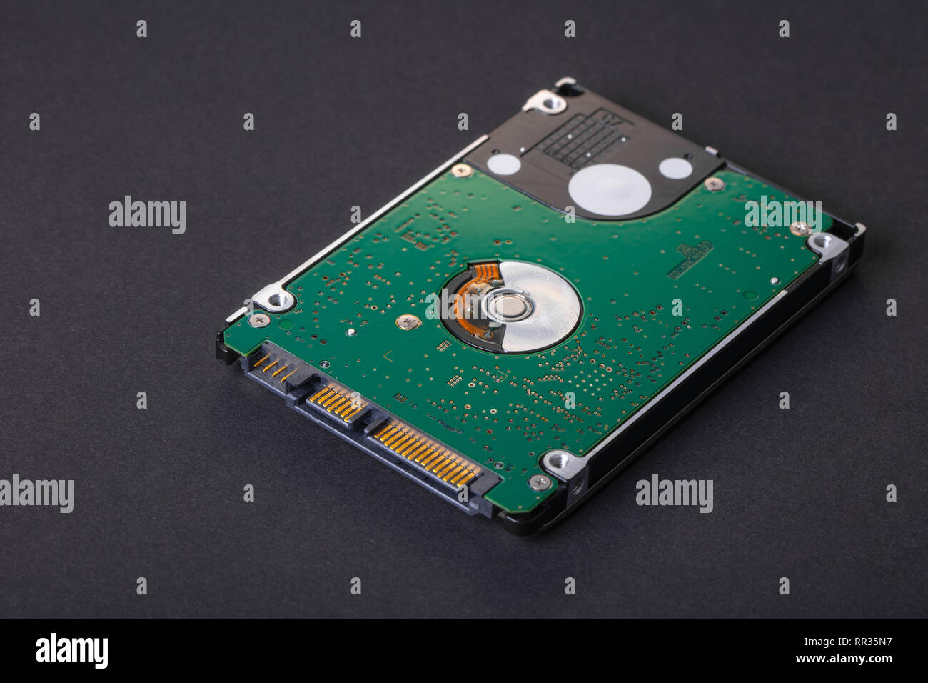 computer hard drive closeup on black background Stock Photo - Alamy