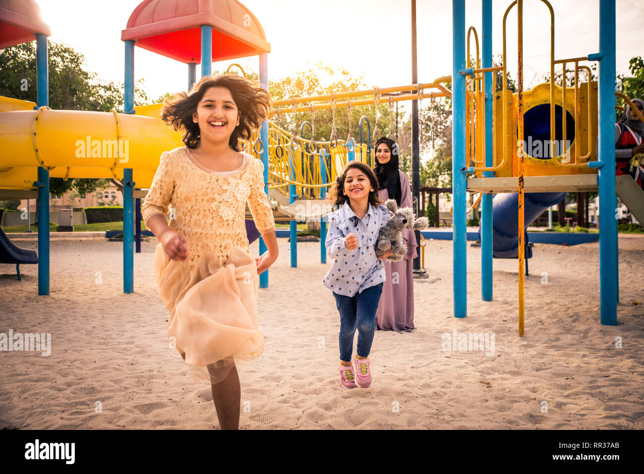 Happy arabian family having fun in Dubai - Mom together with her ...