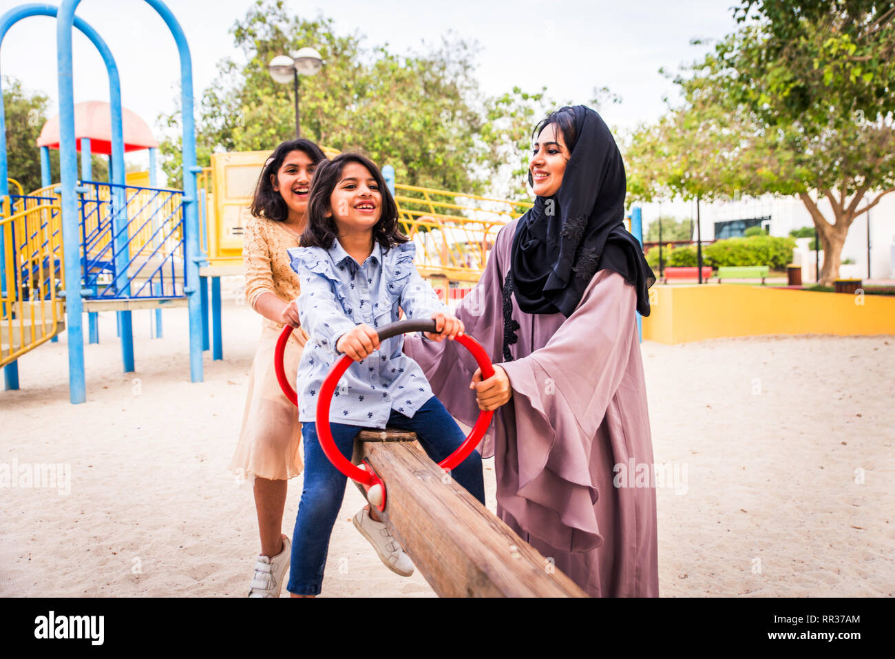 Happy arabian family having fun in Dubai - Mom together with her ...