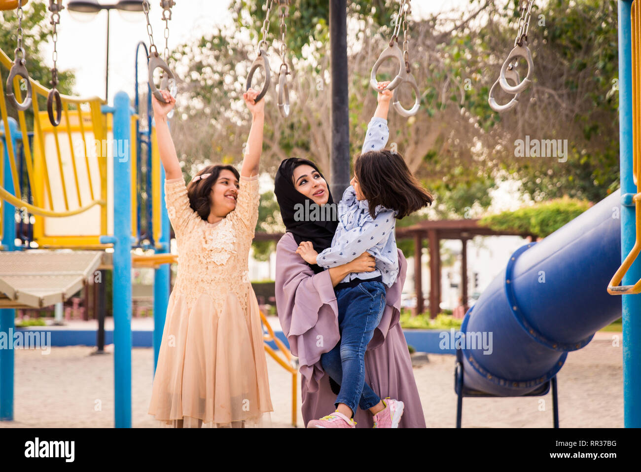 Happy arabian family having fun in Dubai - Mom together with her ...
