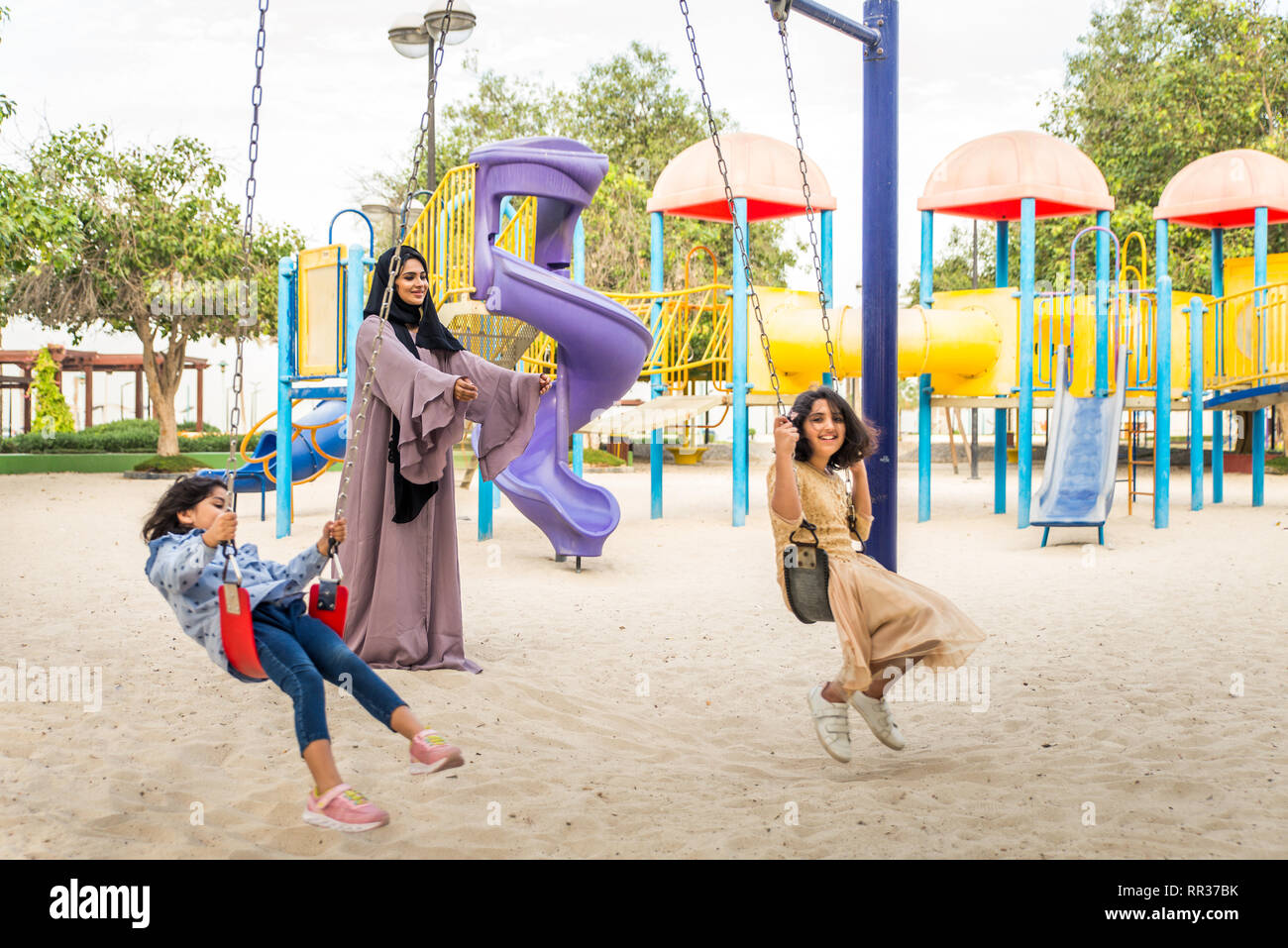 Happy arabian family having fun in Dubai - Mom together with her ...
