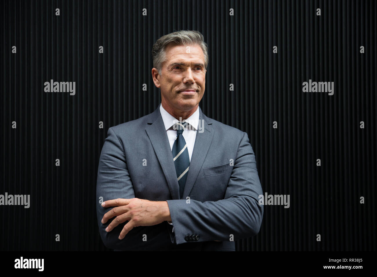 Senior corporate manager with elegant suit outdoors - Businessman in ...