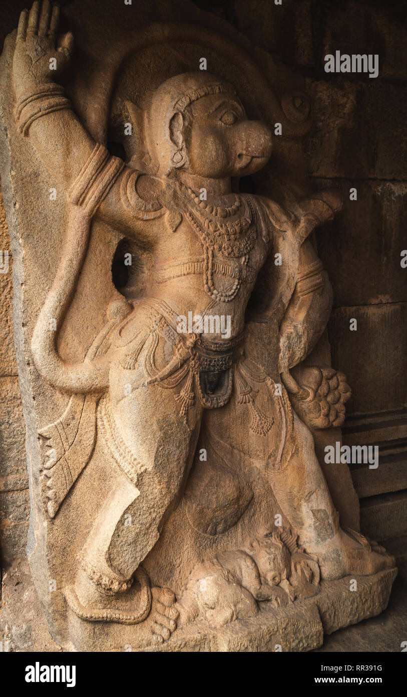 monkey sculpture over a big stone in india karnakata hampi Stock Photo ...