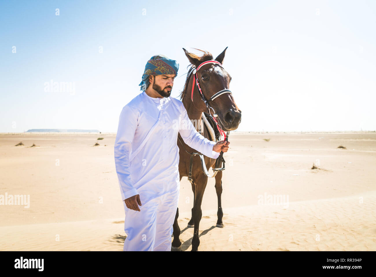 Arab man walk horse hi-res stock photography and images - Alamy