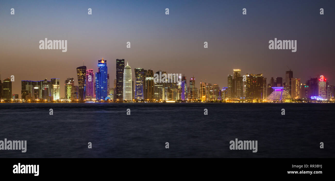 General view of the Doha skyline at night Stock Photo - Alamy