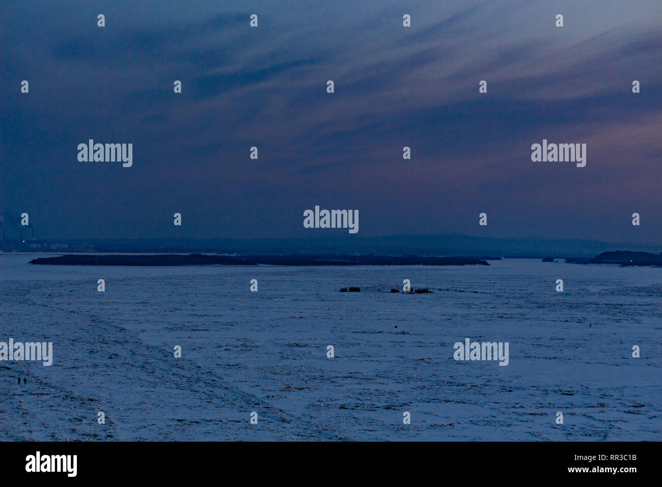Beautiful sunset over the Amur river in Khabarovsk. Winter. Frozen ...