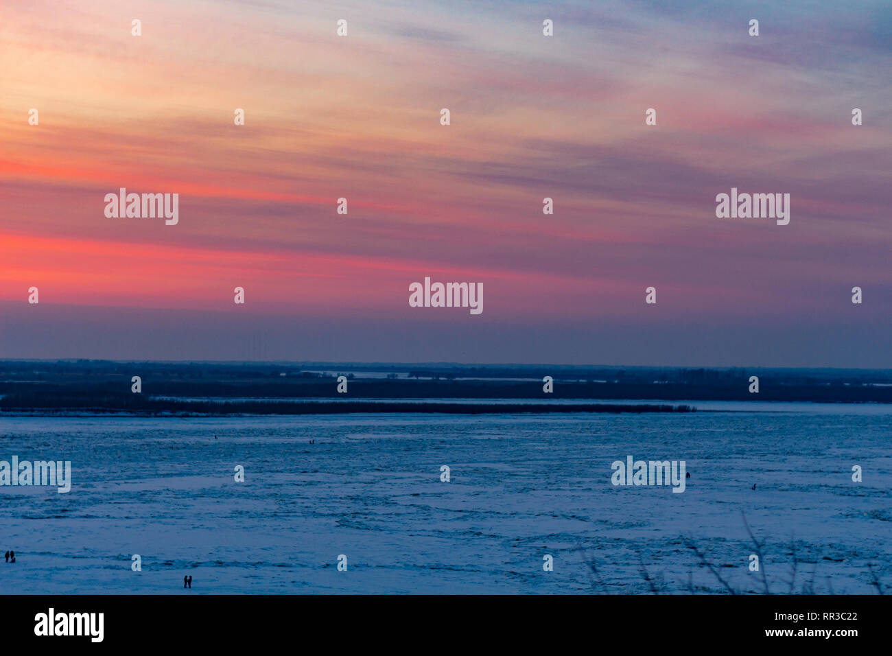Beautiful sunset over the Amur river in Khabarovsk. Winter. Frozen ...