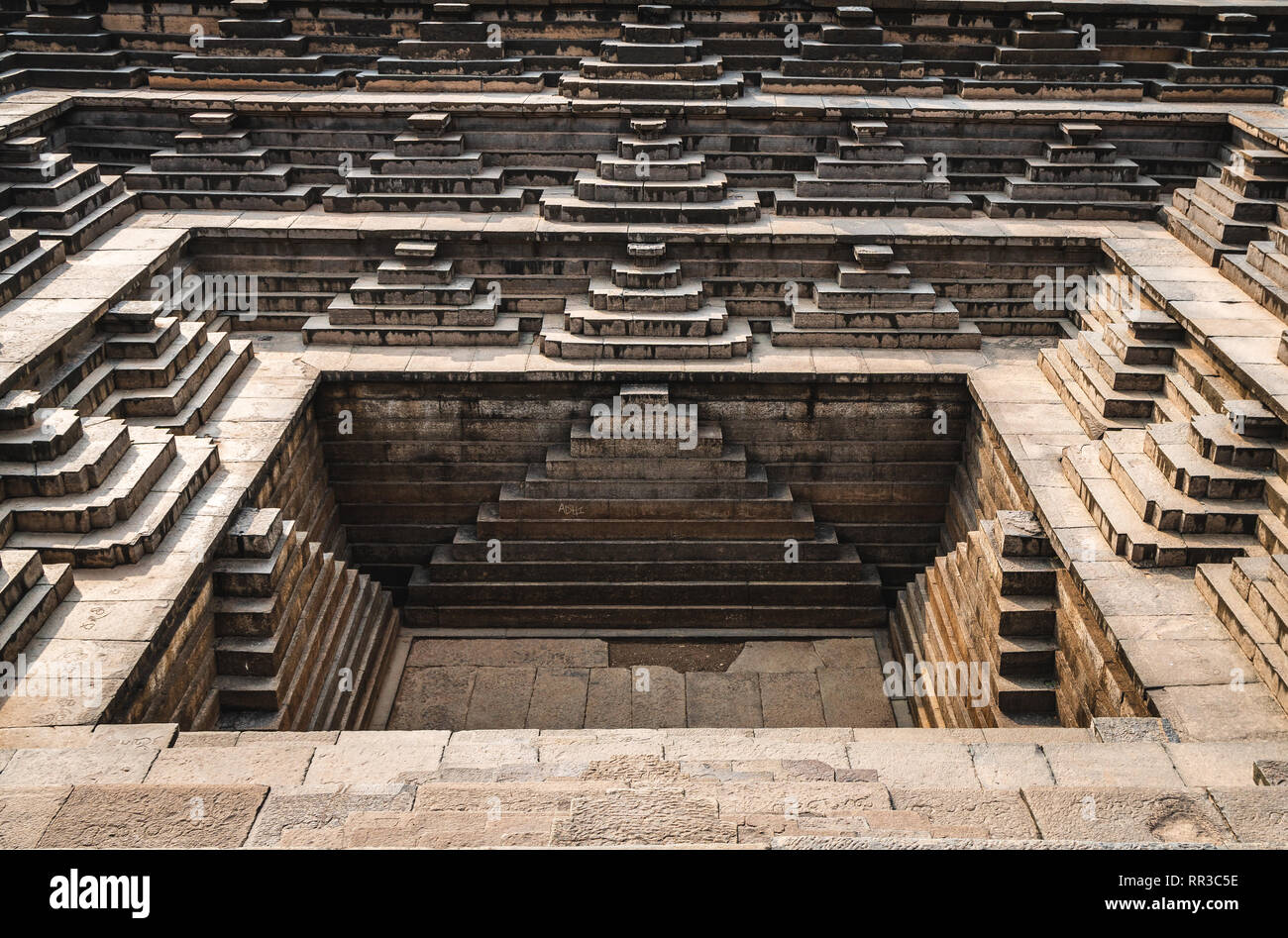 Stepped Tank of the Vijayanagara Empire stone rock in Hampi Karnataka ...
